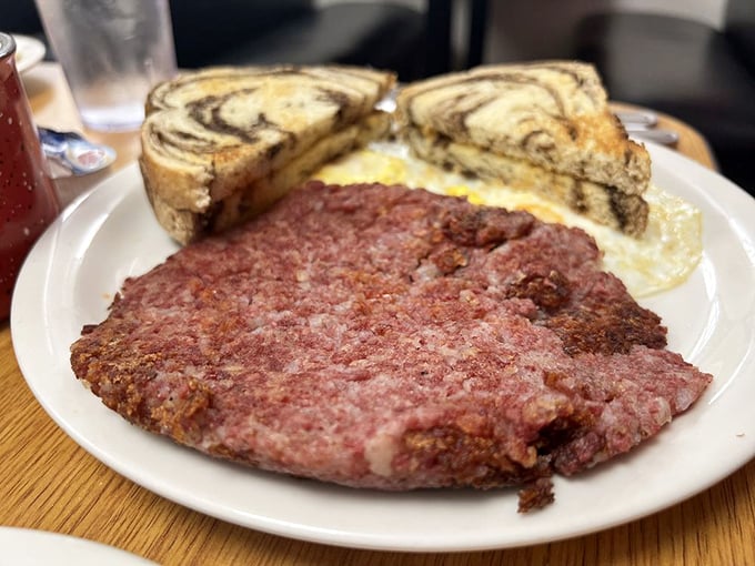 Corned beef hash that doesn't come from a can? Revolutionary! This crispy, savory masterpiece makes chain restaurants weep with inadequacy.