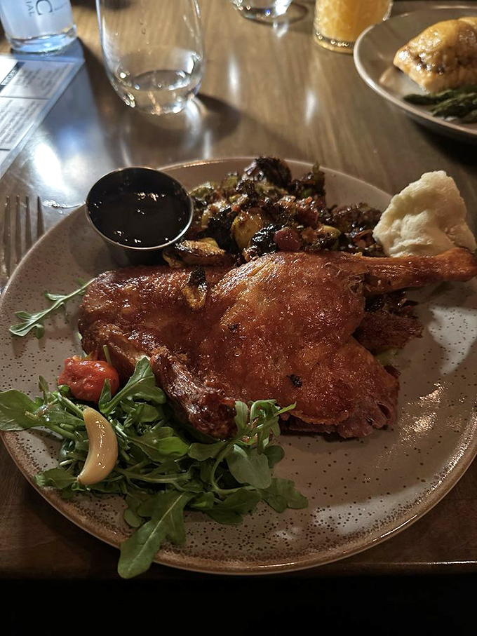 Crispy duck that would make Julia Child swoon. The golden skin crackles with each bite while seasonal vegetables add color to this masterpiece. 