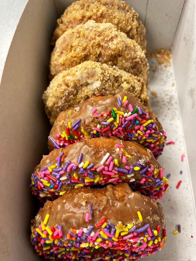 A rainbow of sprinkles meets golden perfection in this box of pure childhood joy and adult satisfaction.