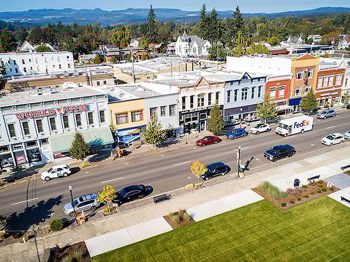 An aerial view that captures Dallas's perfect balance &ndash; historic downtown buildings nestled against rolling hills with mountains on the horizon.