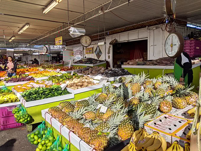 Fresh pineapples and tropical fruits create a rainbow that puts your grocery store's produce section to shame.