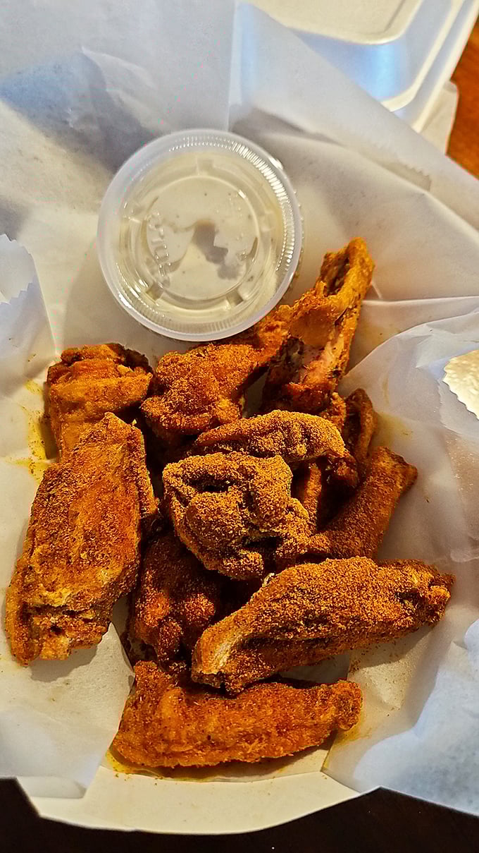 Dry-rubbed wings that look like they've been dusted with flavor fairy dust. The crispy exterior practically audibly crackles through the photo.