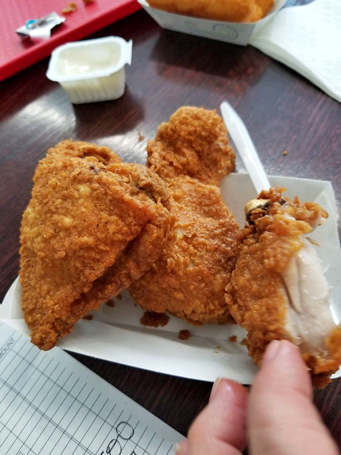 Golden-brown perfection that makes you want to high-five the cook. This chicken's crackling skin gives way to juicy meat that's worth every napkin.