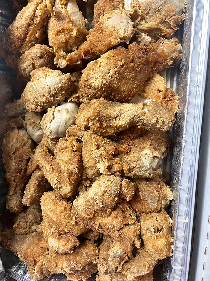 Golden-brown perfection in a pan. This isn't just fried chicken; it's an edible history lesson of Serbian-influenced American culinary tradition.