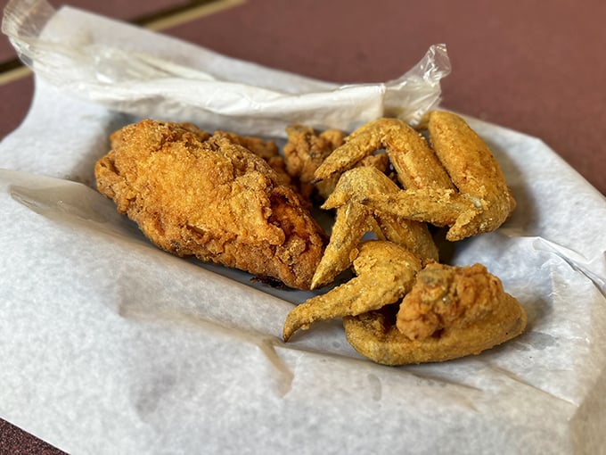 Golden-brown perfection isn't just a goal here, it's a religion. This fried chicken achieves that mythical balance between crispy exterior and juicy interior.