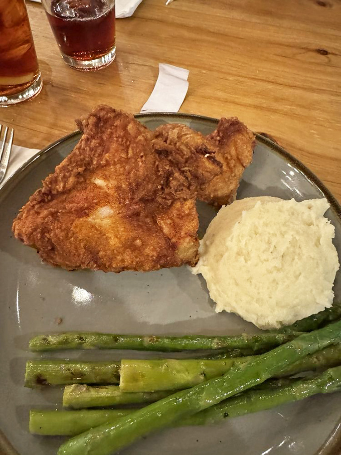 This fried chicken doesn't just talk the talk—it's crispy, juicy proof that sometimes the bird is indeed the word in a barbecue joint.