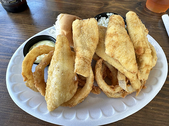 Golden-fried perch that shatters with each bite, paired with those perfect onion rings&mdash;proof that simplicity, when done right, is culinary poetry.