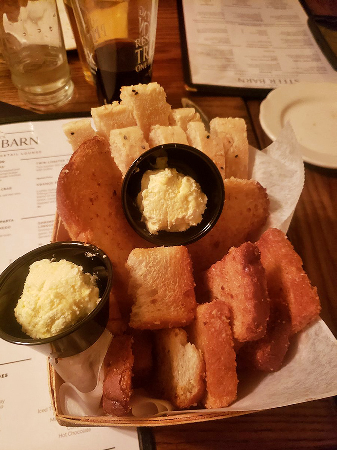 Not just bread before dinner, but a golden-brown prelude to greatness&mdash;crispy garlic toast with whipped butter that demands your full attention.