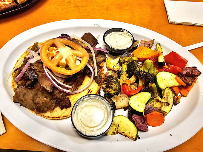 This isn't just a gyro&mdash;it's a Mediterranean masterpiece with perfectly seasoned meat, fresh vegetables, and tzatziki sauce worth writing home about.