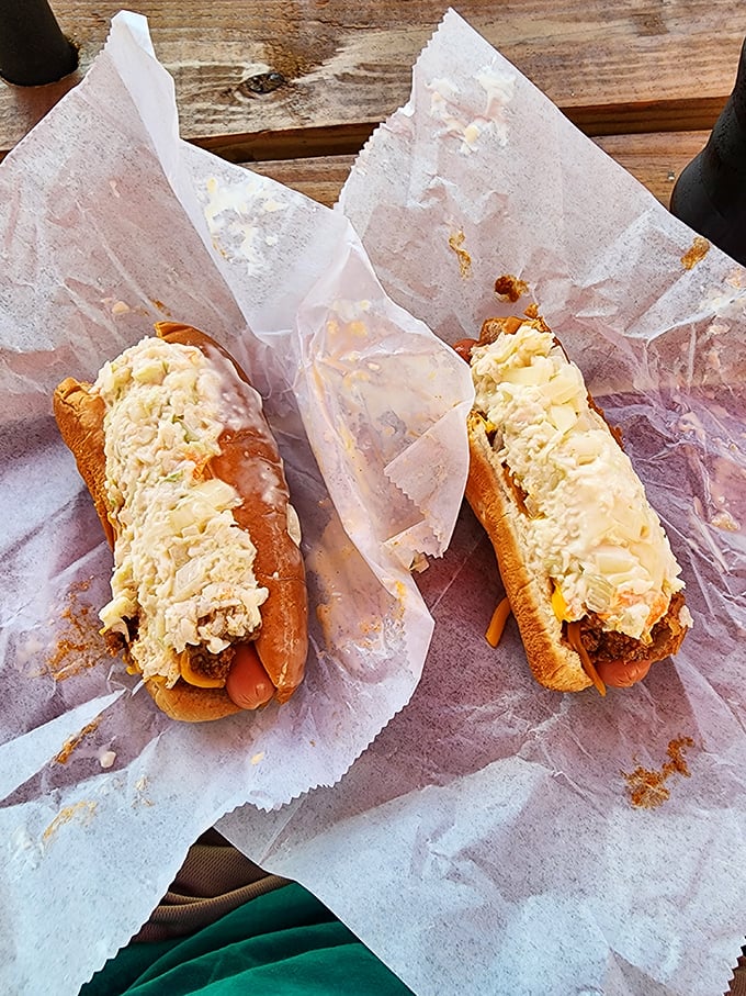 These cheese-smothered beauties aren't just hot dogs; they're edible proof that simplicity, when done right, becomes extraordinary.