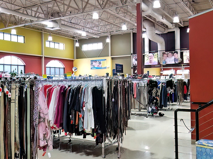 Color-coded clothing racks create a rainbow of possibilities. The store's thoughtful organization system means you'll spend less time searching, more time finding.
