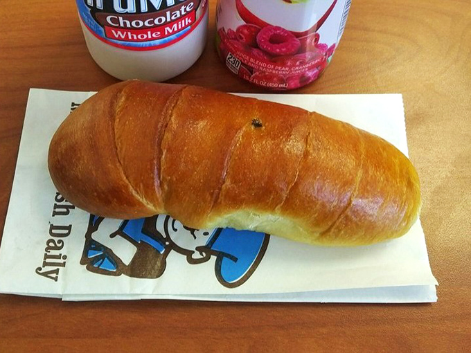 This kolache isn't just breakfast, it's edible architecture &ndash; a perfect balance of pillowy dough and savory filling that puts ordinary breakfast sandwiches to shame.