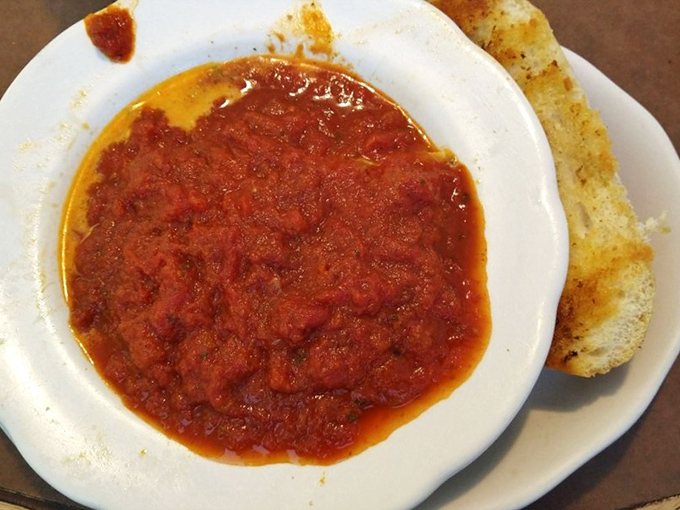 Breakfast innovation at its finest: a cinnamon raisin swirl nestled alongside fluffy eggs and home fries. Morning glory on a plate!