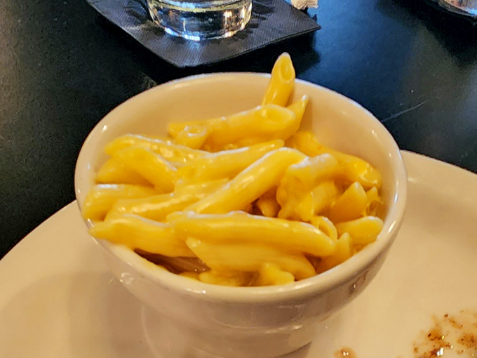 Mac and cheese so golden and glistening, it makes you wonder if this is what they meant by "the Mountain State's precious metals."