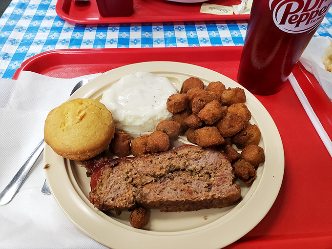 This isn't just meatloaf&mdash;it's edible nostalgia on a plate, complete with cornbread and okra that would make your grandmother both proud and jealous.