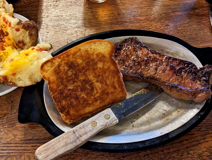 Behold the star of the show &ndash; a perfectly seared New York Strip alongside a loaded baked potato. Simple? Yes. Life-changing? Absolutely.