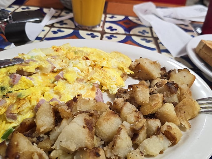 Western omelet and home fries: the breakfast power couple that makes you wonder why anyone would ever settle for a protein bar.