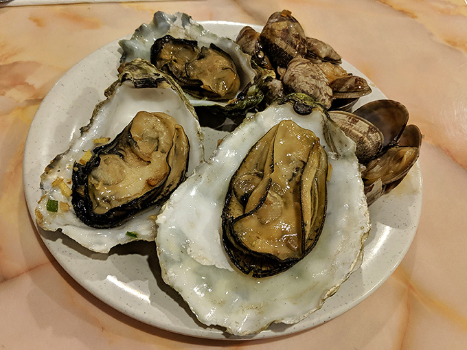 Fresh oysters await their destiny at Super King – briny treasures of the sea that make you wonder why we ever bothered cooking food in the first place.