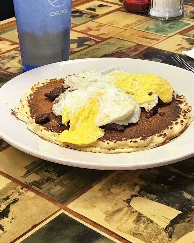 Breakfast perfection doesn't need fancy plating&mdash;just a pancake canvas painted with meat and eggs, ready for your morning masterpiece.