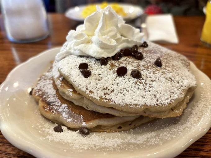 Chocolate chip pancakes with a mountain of whipped cream&mdash;because sometimes breakfast should feel like you're getting away with something deliciously naughty.
