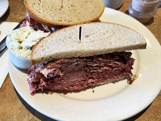 Behold the pastrami sandwich in its natural habitat &ndash; stacked higher than your cardiologist would recommend, but worth every delicious bite.