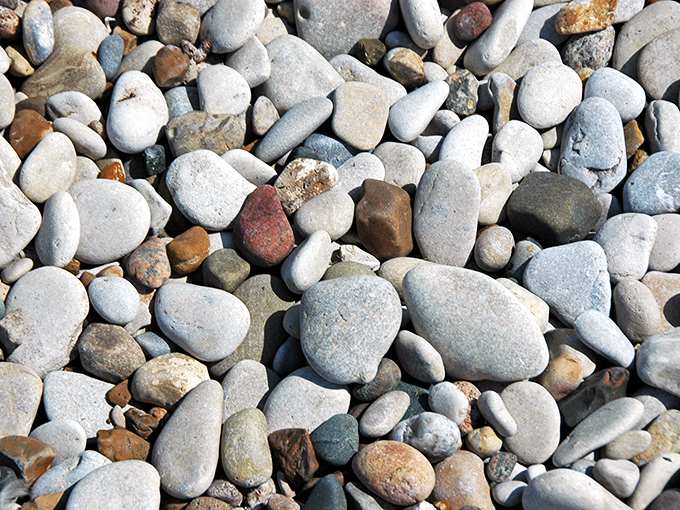 Nature's rock tumbler has been working overtime! These perfectly polished stones represent millions of years of patient craftsmanship by Lake Erie's persistent waves.