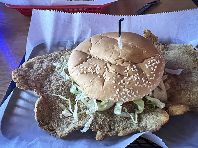 The tenderloin that ate Manhattan! This breaded beauty extends well beyond its bun, creating the delicious dilemma of where to take your first bite.