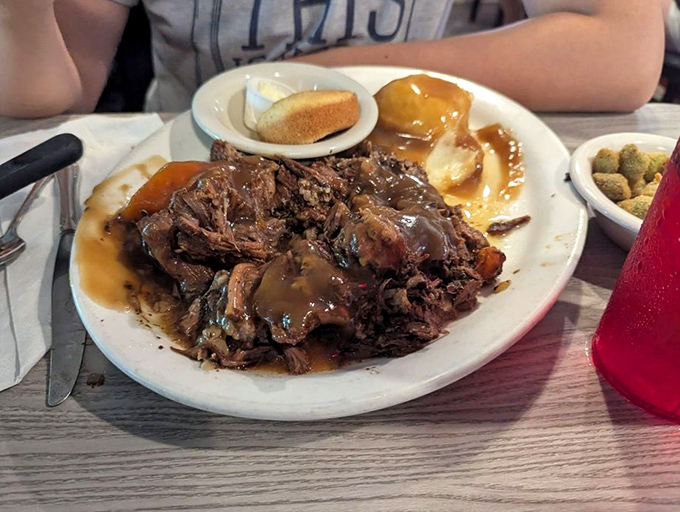 This isn't just pot roast&mdash;it's a master class in patience, where tough cuts surrender into fork-tender submission under a blanket of soul-satisfying gravy.