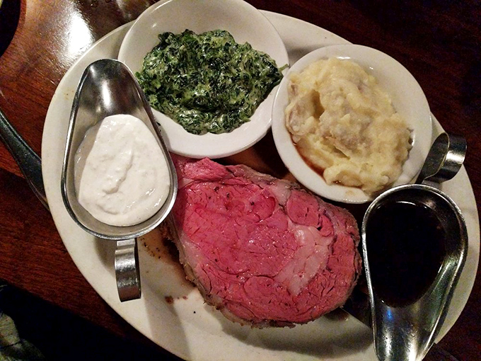 Prime rib so perfectly pink it could make a vegetarian question their life choices. Served with creamed spinach and mashed potatoes&mdash;the holy trinity of steakhouse bliss.