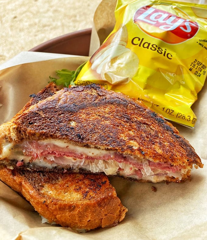 Not all heroes wear capes&mdash;some come on toasted bread with perfectly melted cheese and sauerkraut. This Reuben deserves its own fan club.