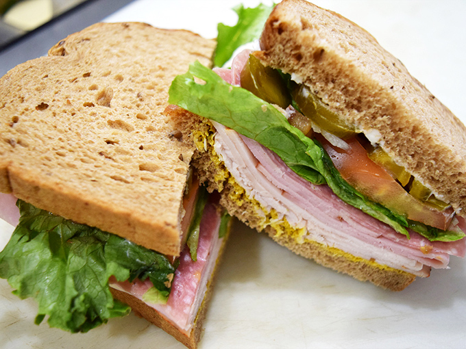 Behold the architectural marvel that is a proper deli sandwich &ndash; layers of goodness that make you wonder why you ever settled for drive-thru fare. 