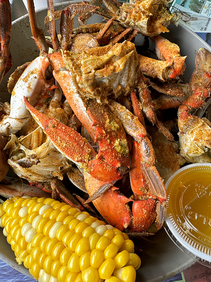 Seafood doesn't get more glorious than this – seasoned blue crabs piled high with corn on the cob and butter sauce standing by.