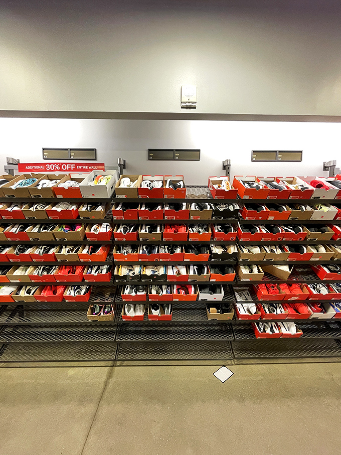 The promised land of footwear: row after row of discounted sneakers waiting for their Cinderella moment with shoppers seeking both style and savings.