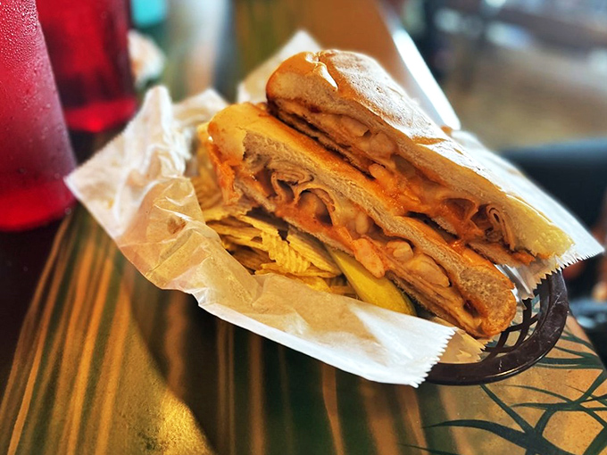 This isn't just a sandwich; it's a structural marvel of Cuban engineering. Layers of flavor stacked higher than the nearby rocket assembly buildings.