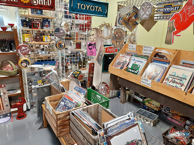 A time-traveling wall of nostalgia where Ford, Texaco, and Harley-Davidson logos remind us when brands were works of art.