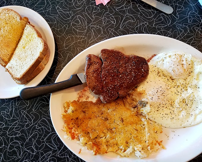 Steak and eggs: the breakfast of champions. A perfectly seared cut alongside golden hash browns and eggs&mdash;the holy trinity of morning indulgence.