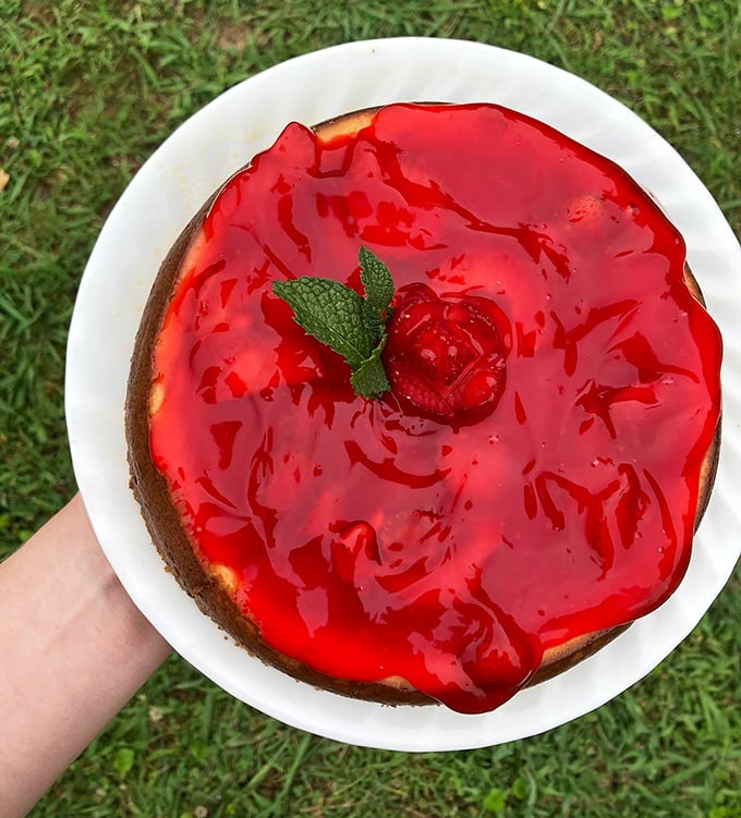 This strawberry cheesecake isn't just breaking vegan dessert barriers&mdash;it's shattering them, then rebuilding them with a glistening ruby topping that whispers, "Resistance is futile."