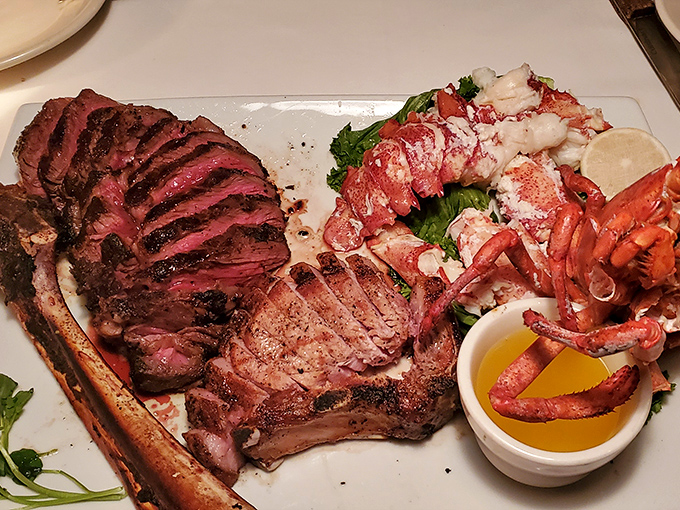 The surf and turf that launched a thousand diet cheat days. That perfectly seared steak alongside lobster is basically a formal invitation to food euphoria.