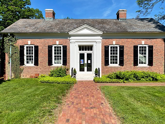 The Keeler Tavern Museum stands as elegant proof that Georgian architecture ages better than most Hollywood actors. That brick pathway practically begs for your footsteps.