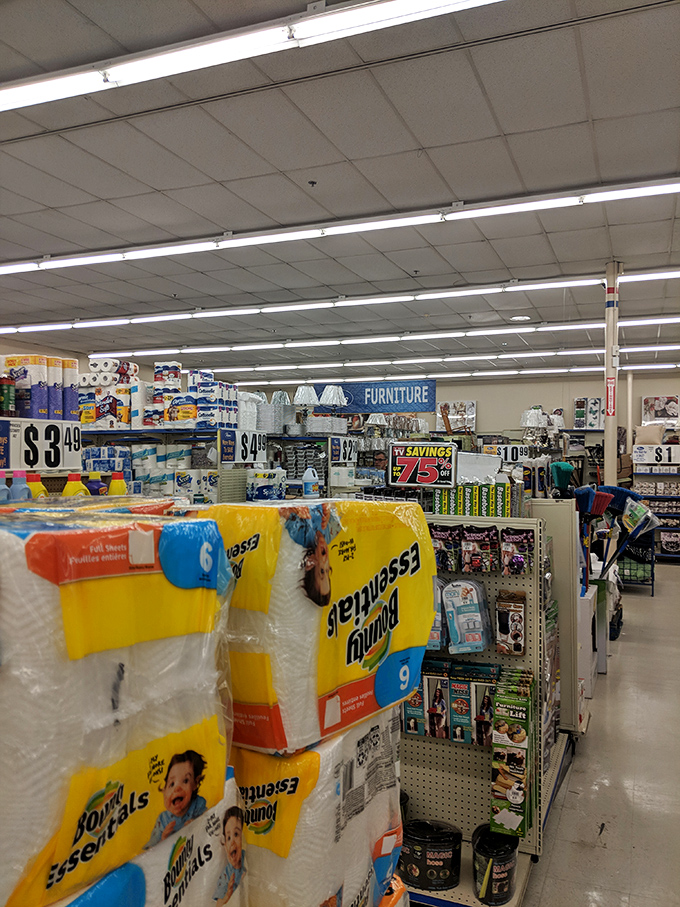 Paper products and household essentials occupy their own zip code here. That "Savings" sign isn't kidding—your wallet will thank you later.