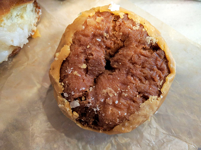 This chocolate-filled donut hole contains more joy than something this small has any right to possess. Diet plans, consider yourselves warned.