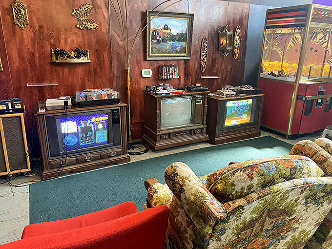 The living room time capsule corner, where vintage consoles and wood-paneled TVs remind us that gaming wasn't always about 4K resolution and downloadable content.