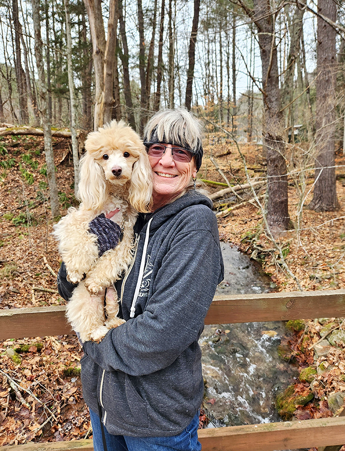 The joy of discovering a woodland trail with your four-legged companion. Some therapy sessions require no couch, just pine-scented air.