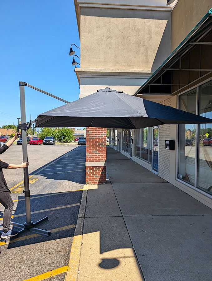 Sunny days and patio umbrellas - even the outside of this thrift store invites you to linger and browse.