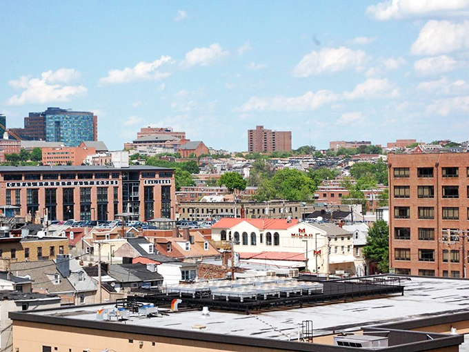 Baltimore's skyline plays peekaboo with the clouds, a metropolitan masterpiece that's equal parts grit and glamour.