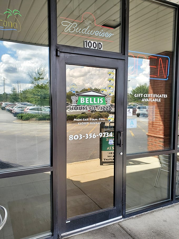 Bellis House of Pizza keeps it simple with a clean storefront and clear message: we're here to serve great pizza, period.