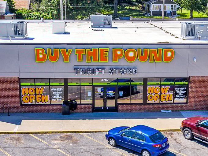 That bold "Buy The Pound" sign doesn't mess around - it's thrift shopping's equivalent of truth in advertising.
