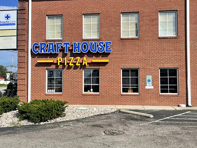 Bold blue signage, bold flavors inside. This unassuming brick building houses Louisville's pizza craftsmanship at its finest.