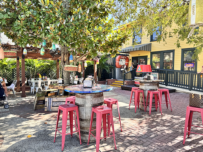 Old-school charm under ancient trees. DJ's outdoor seating invites you to linger over lobster rolls while watching Duval Street's parade of characters.