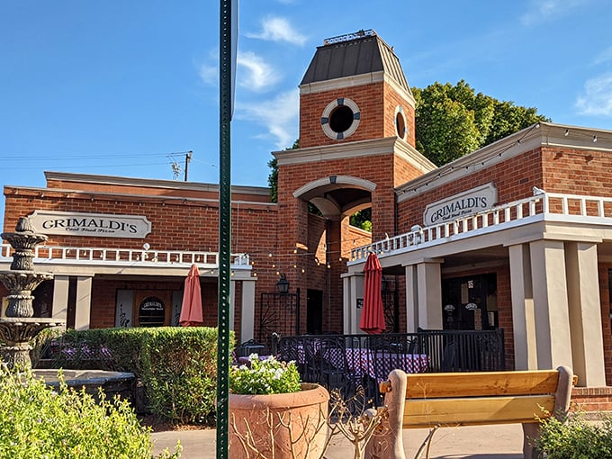 Grimaldi's brick clocktower stands like a slice of Italy transplanted to the desert. The fountain courtyard practically begs you to linger over one more slice.